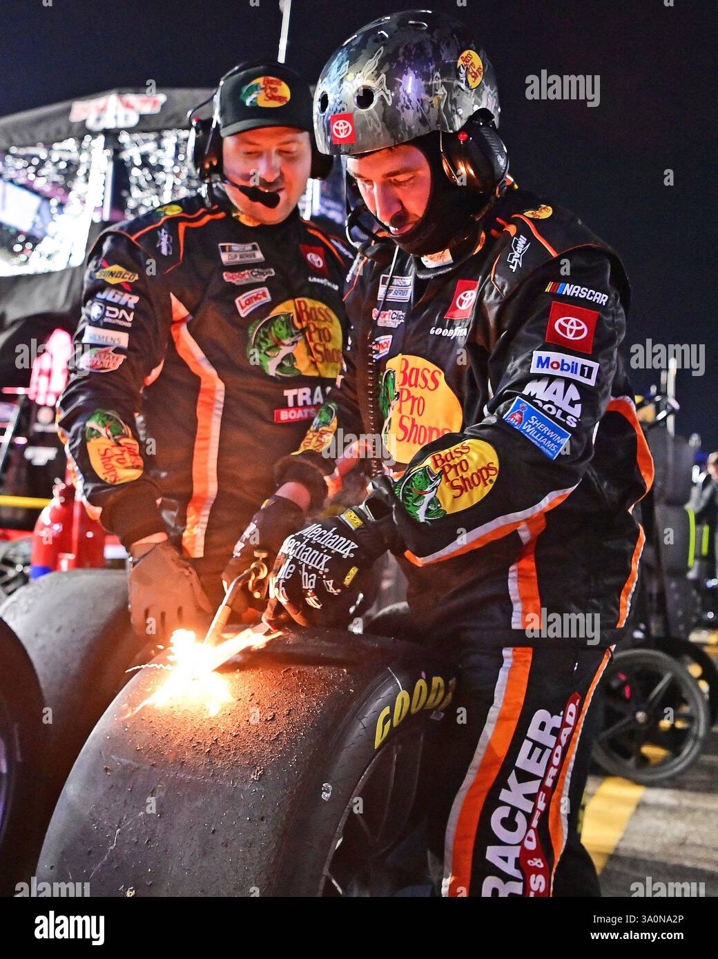 Chase Briscoes pit crew checks his tires for track wear during the ...