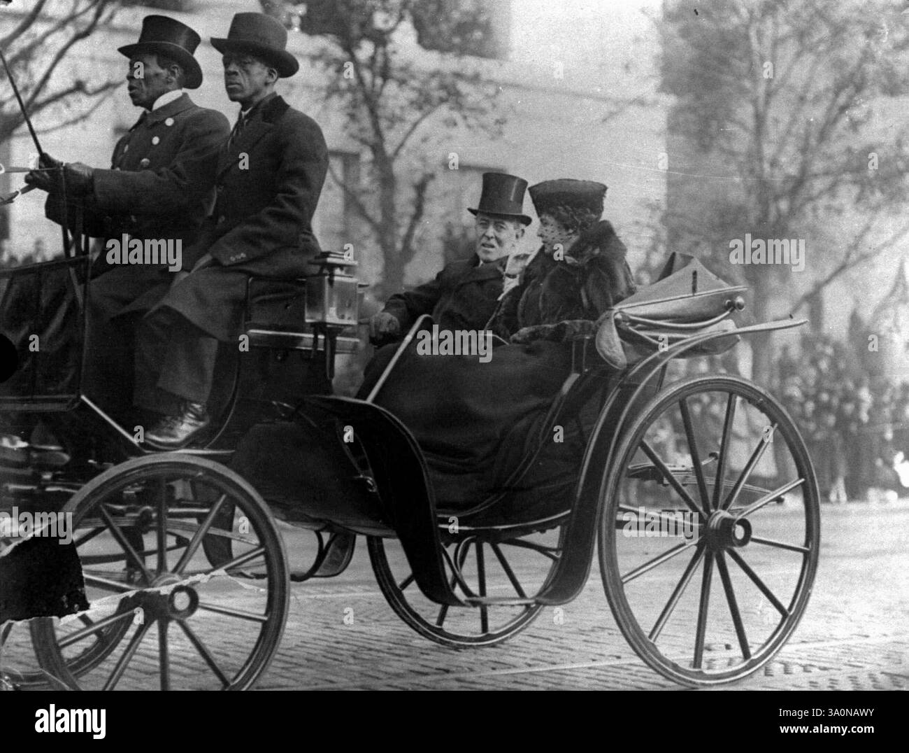 President Woodrow Wilson and wife, Edith Wilson, ride in a carriage on ...