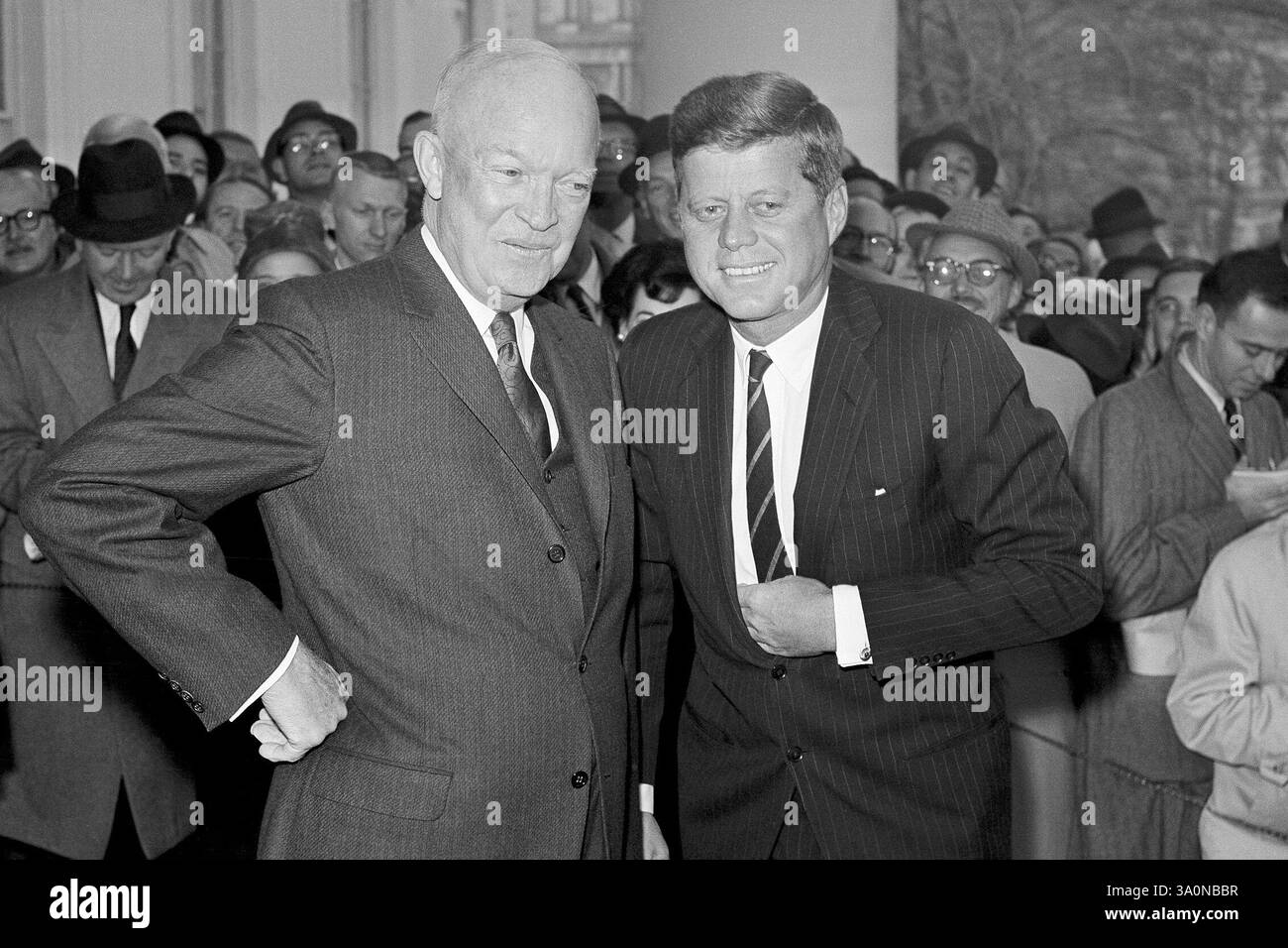 President Dwight Eisenhower poses with President-elect John F. Kennedy ...