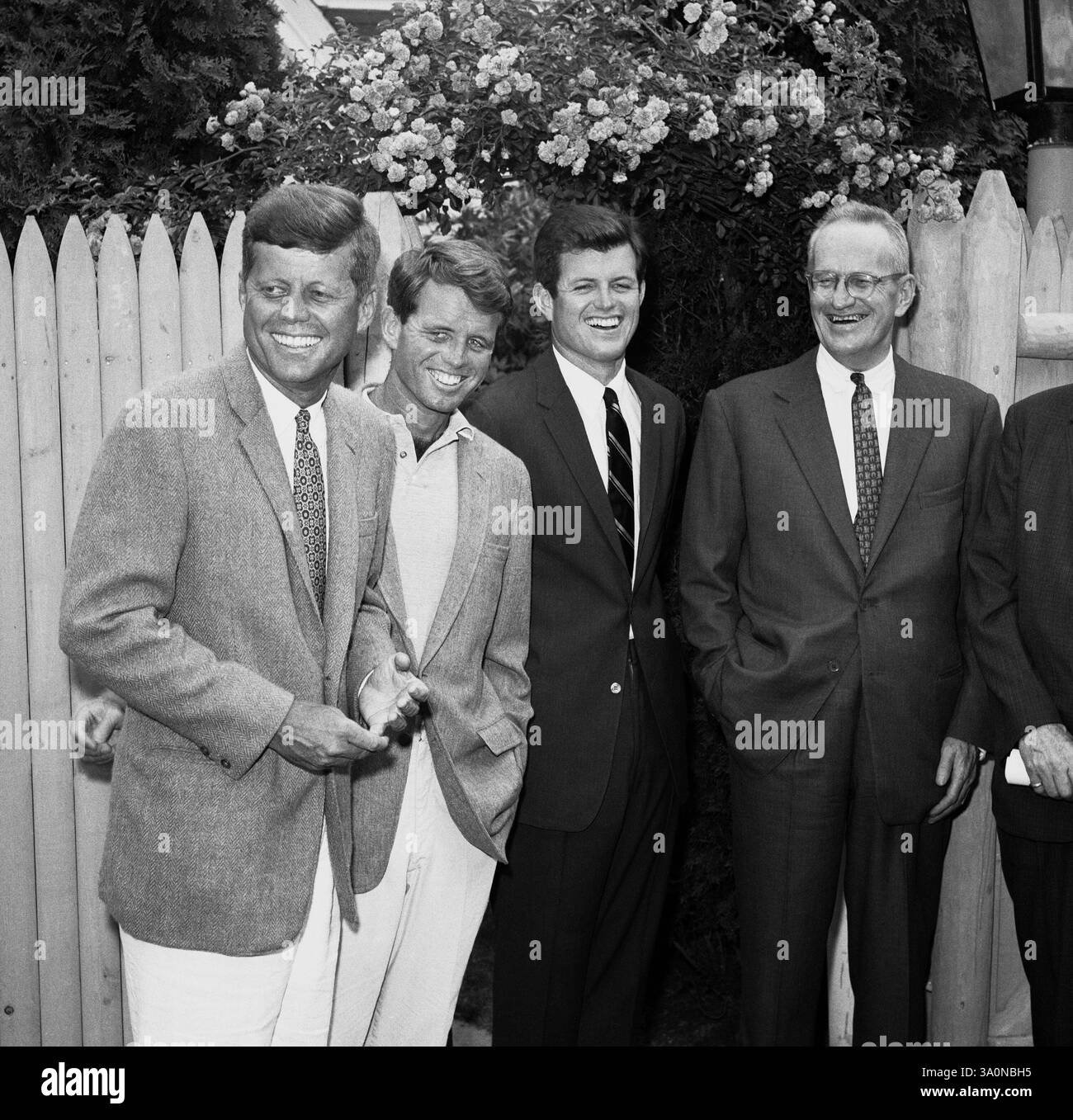 President John F. Kennedy, left, is shown in Hyannis Port, Mass., with ...