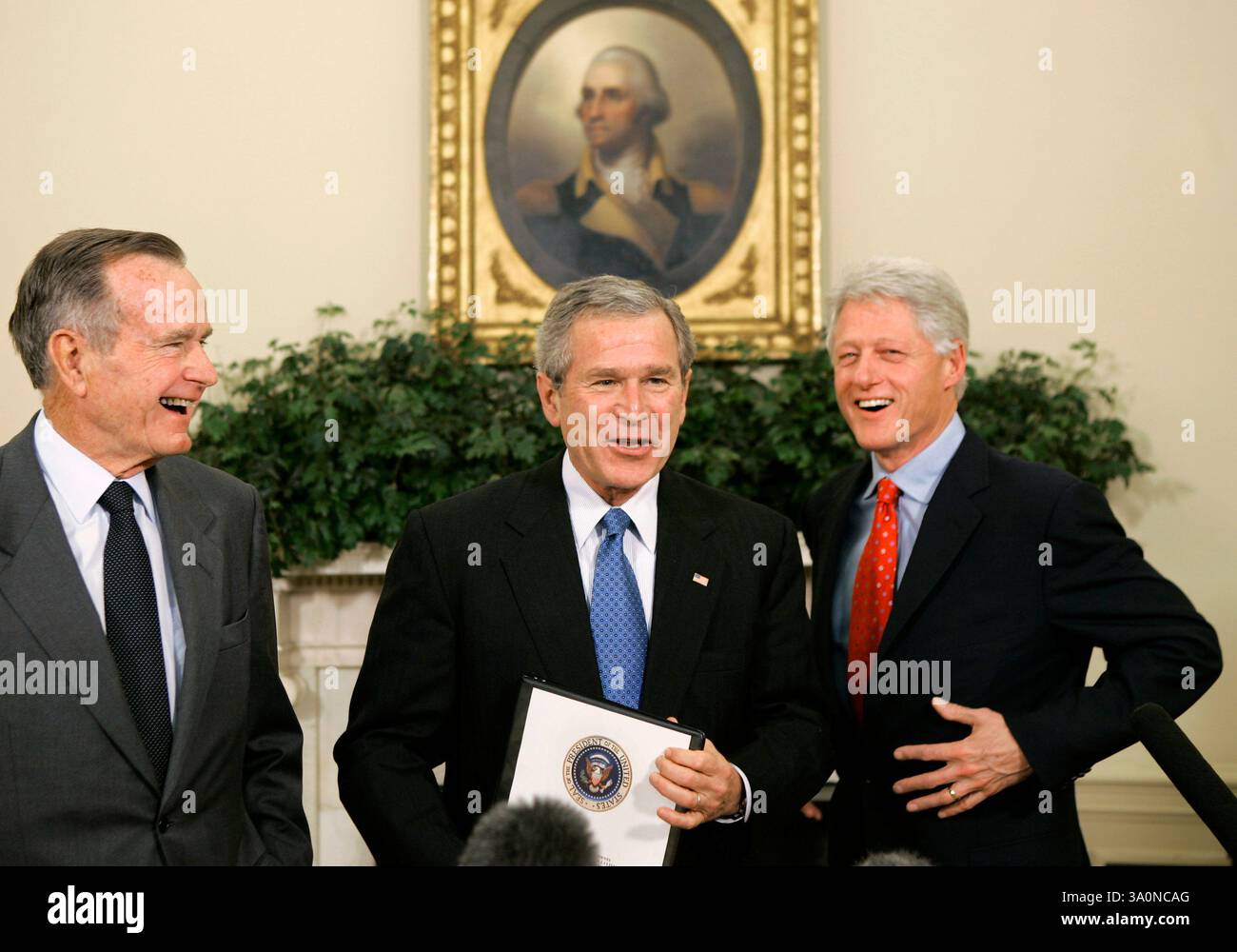 Former presidents President Bill Clinton, right, and President George H ...