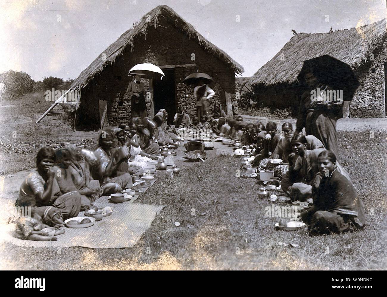 Halftone of pupils ready for dinner time at the Ramabai Mukti Mission ...