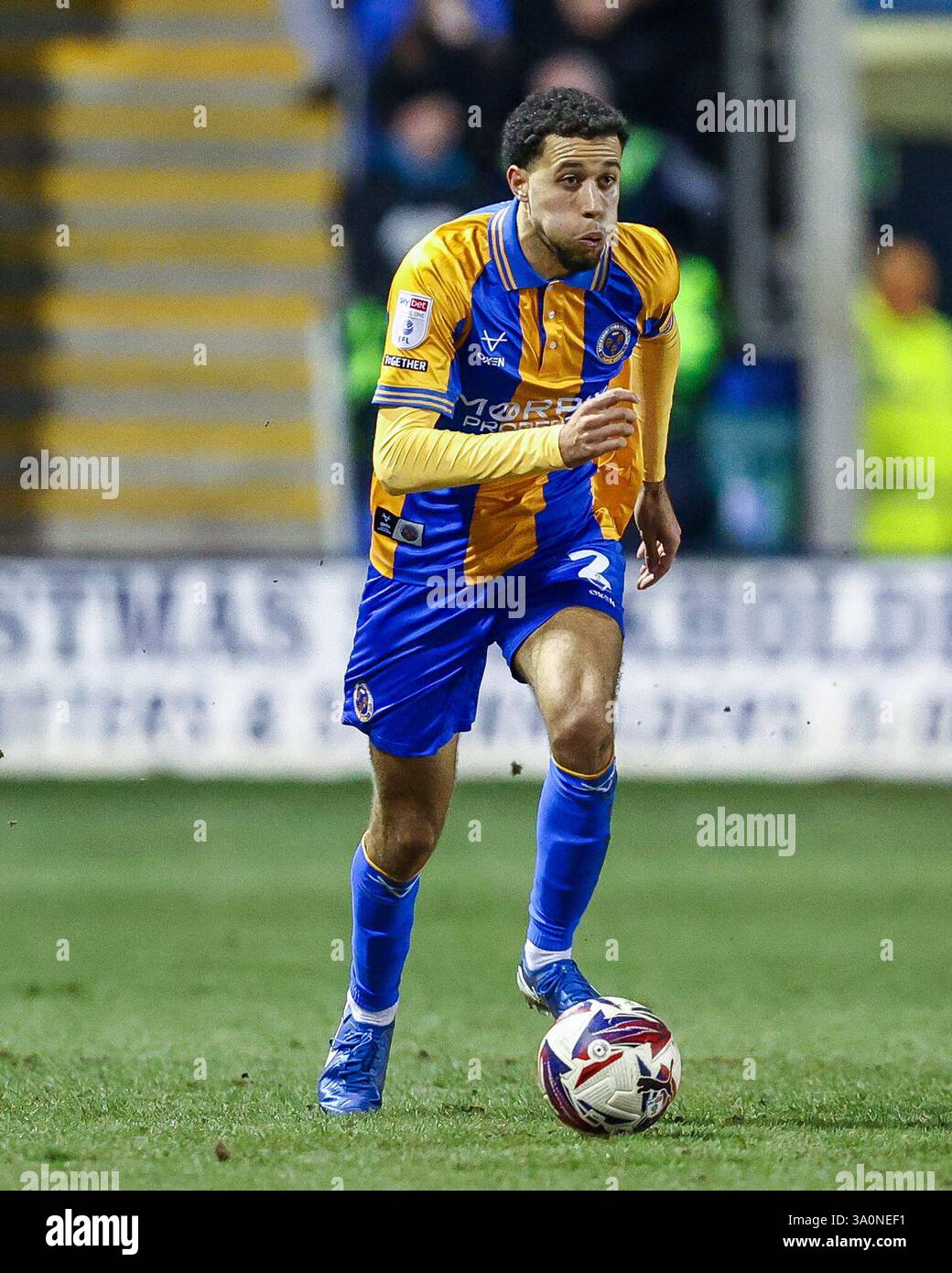 #2, Luca Hoole of Shrewsbury Town races forward with the ball during ...