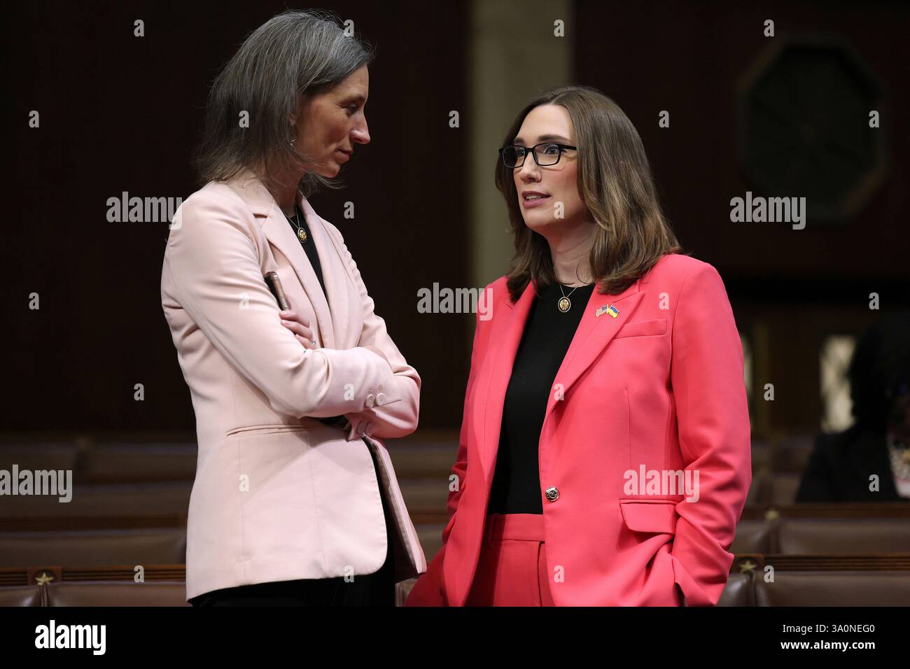 Rep. Maxine Dexter, D-Ore., left, and Rep. Sarah McBride, D-Del., right ...