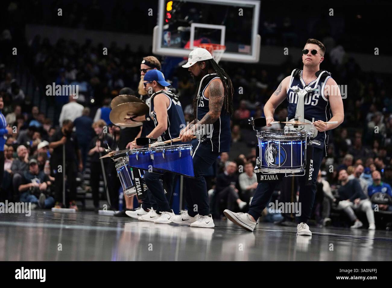The Dallas Mavericks Drum Line performs during an NBA basketball game ...