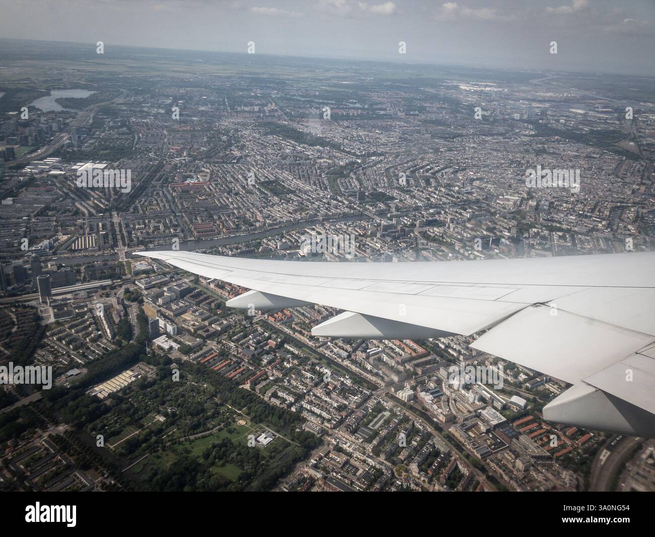 An aerial perspective of Amsterdam’s dense urban layout and historic ...