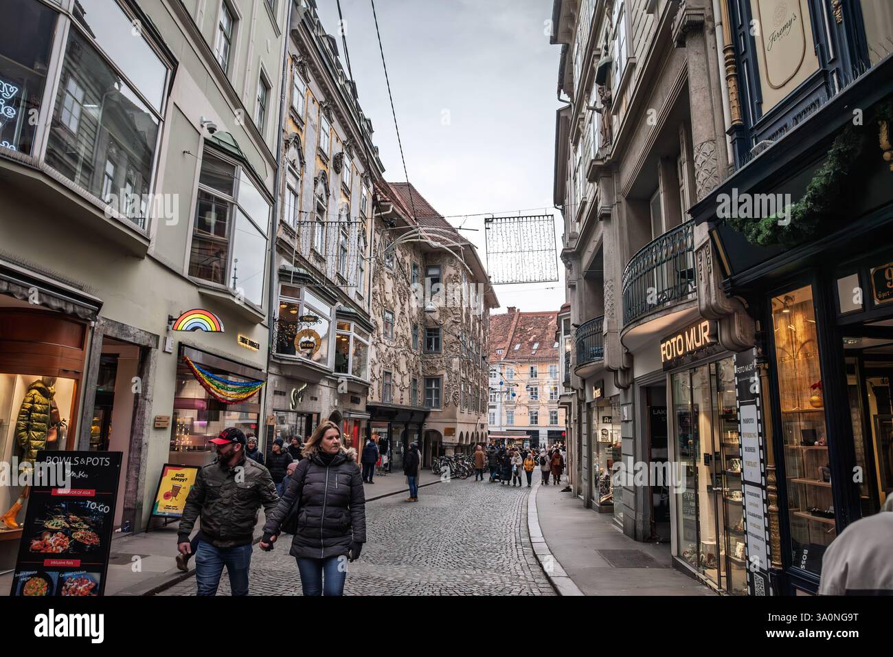 GRAZ, AUSTRIA - DECEMBER 17, 2024: A sweeping look at Sporgasse street ...