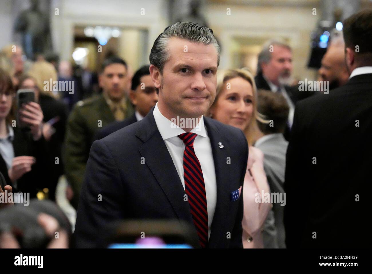 Defense Secretary Pete Hegseth, left, and his wife Jennifer Rauchet ...