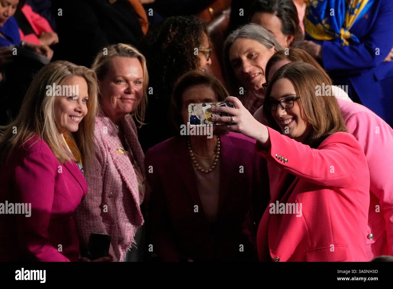 Rep. Sarah McBride, D-Del., takes a photo before President Donald Trump ...