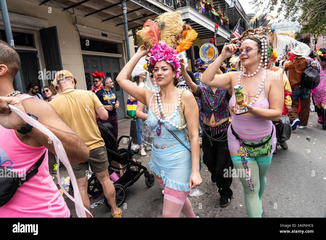 Paradegoers are seen in the French Quarter during Mardi Gras on Tuesday ...