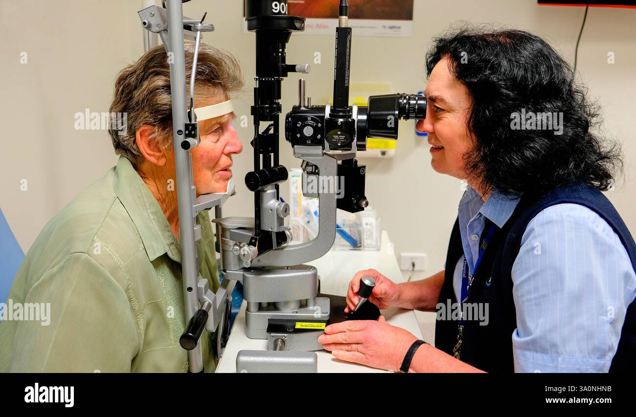 An elderly female patient undergoing an eye check at a hospital in ...