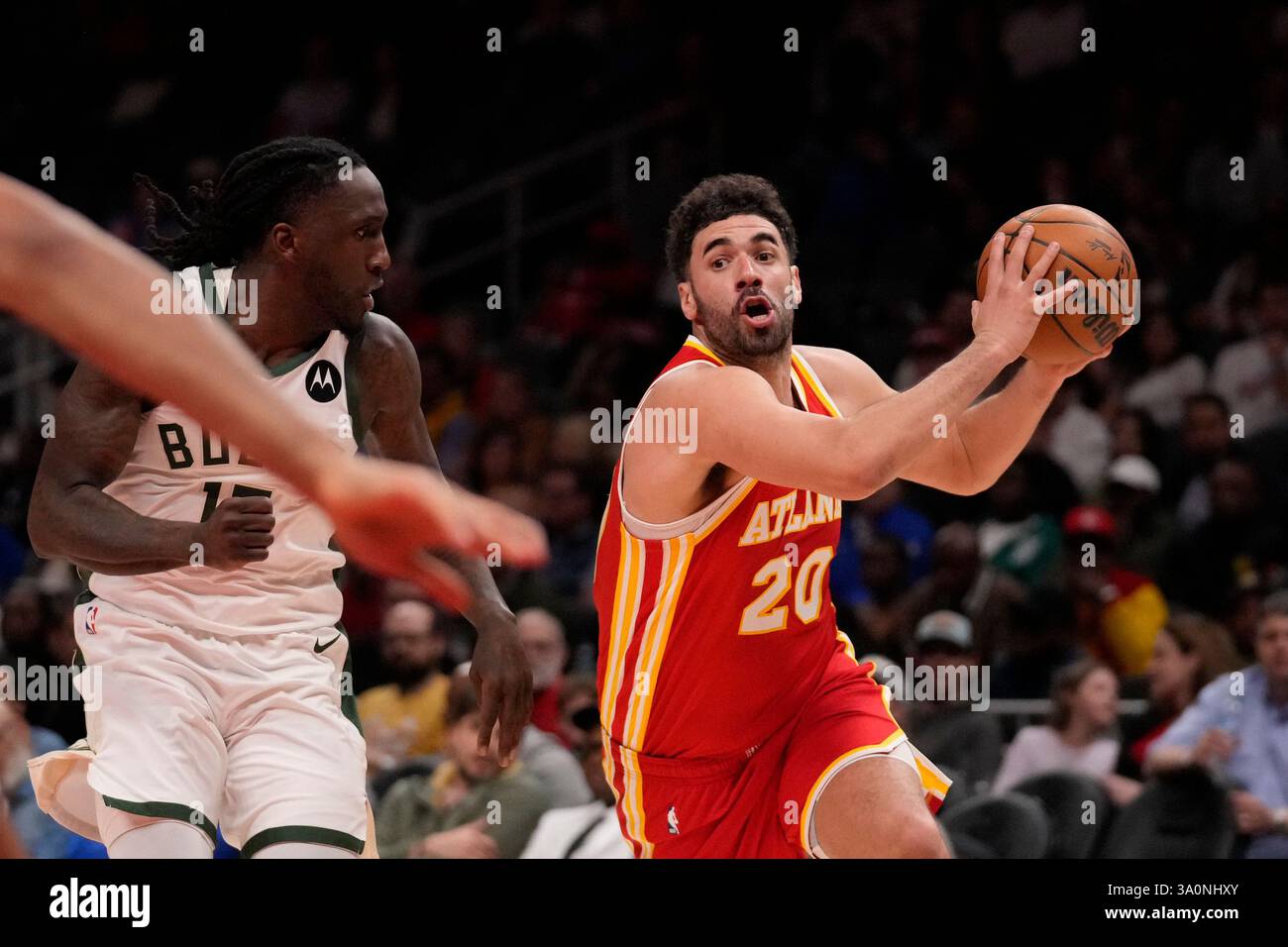 Atlanta Hawks forward Georges Niang (20) drives the ball to the basket in the first half of an ...
