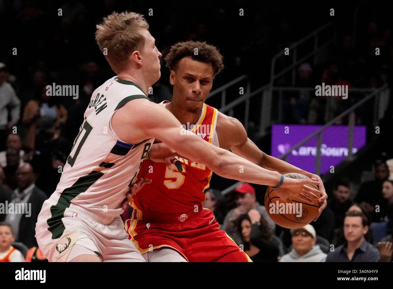 Atlanta Hawks guard Dyson Daniels (5) dribbles the ball in the first ...