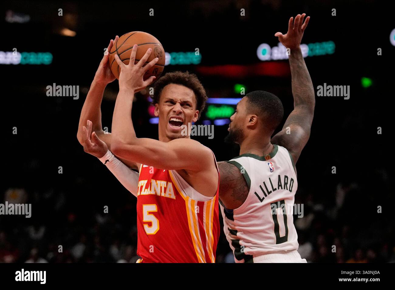 Atlanta Hawks guard Dyson Daniels (5) tries to shoot against Milwaukee ...