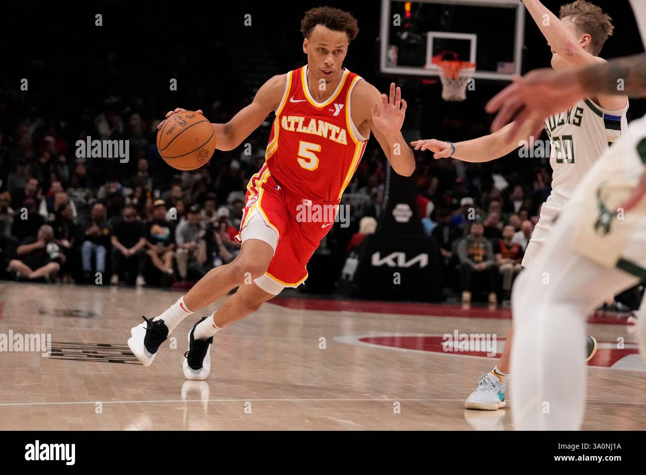 Atlanta Hawks guard Dyson Daniels (5) dribbles the ball in the first ...