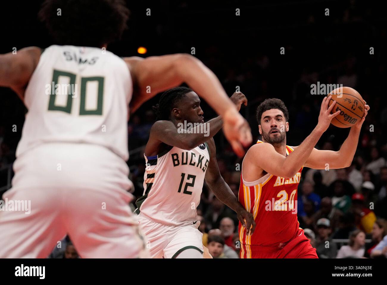 Atlanta Hawks forward Georges Niang (20) drives the ball to the basket ...