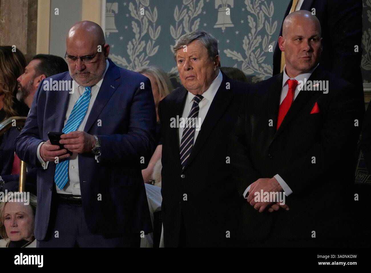 Chris LaCivita, left, and Viktor Knavs, center, arrive before President ...