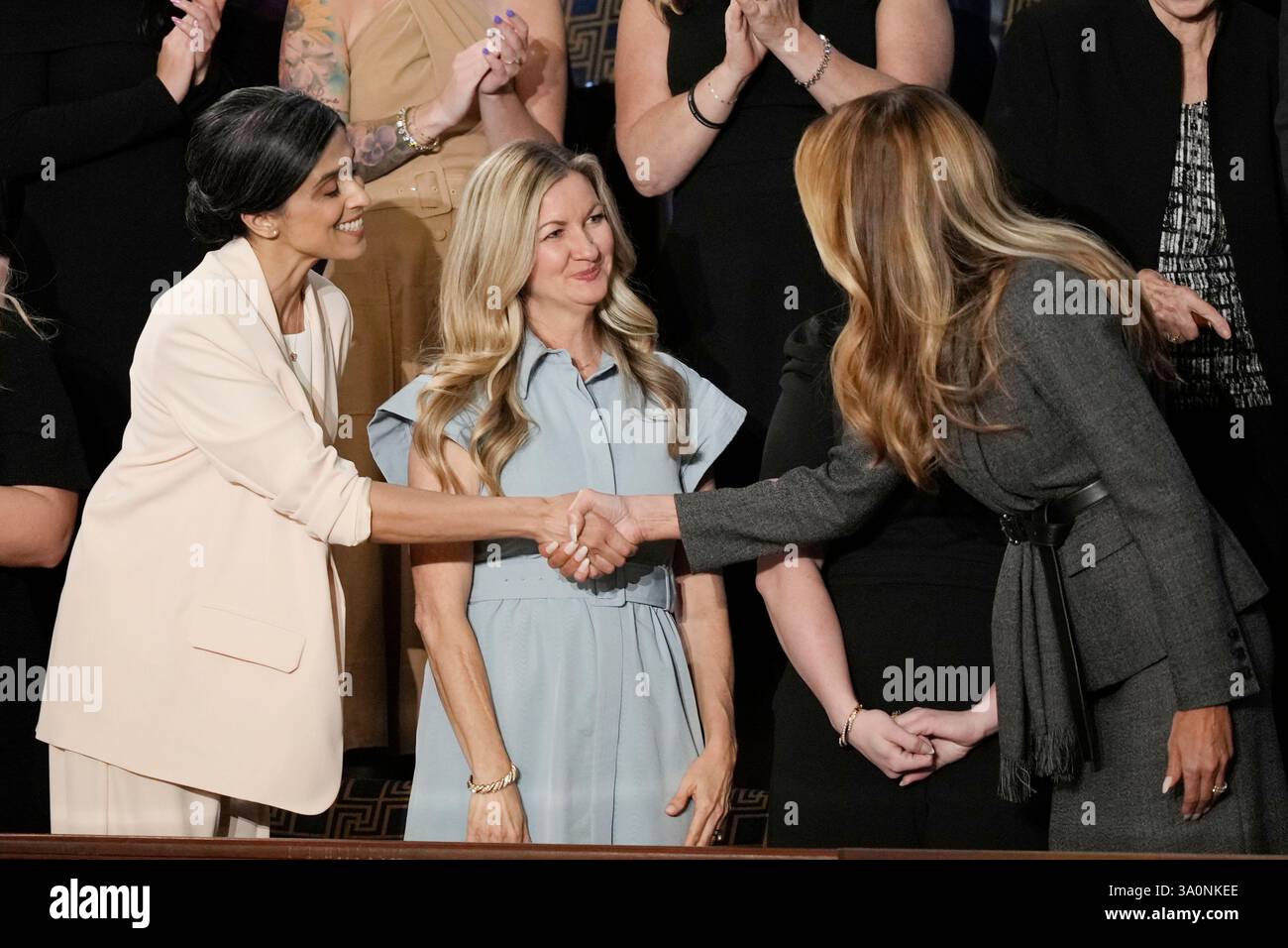 First lady Melania Trump, right, greeting Usha Vance, left, as they ...