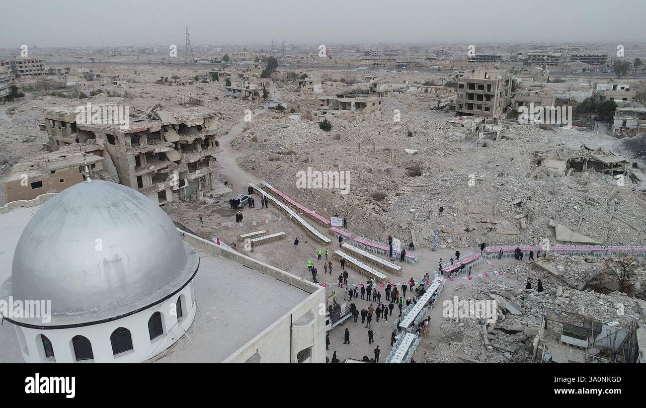Damascus. 4th Mar, 2025. An aerial drone photo shows long iftar tables ...