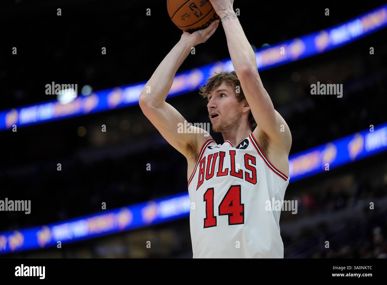 Chicago Bulls forward Matas Buzelis (14) sinks a 3-point shot during the first half of an NBA ...