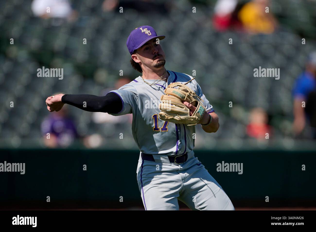LSU Tigers third baseman Mikey Ryan (17) throws to first base during ...