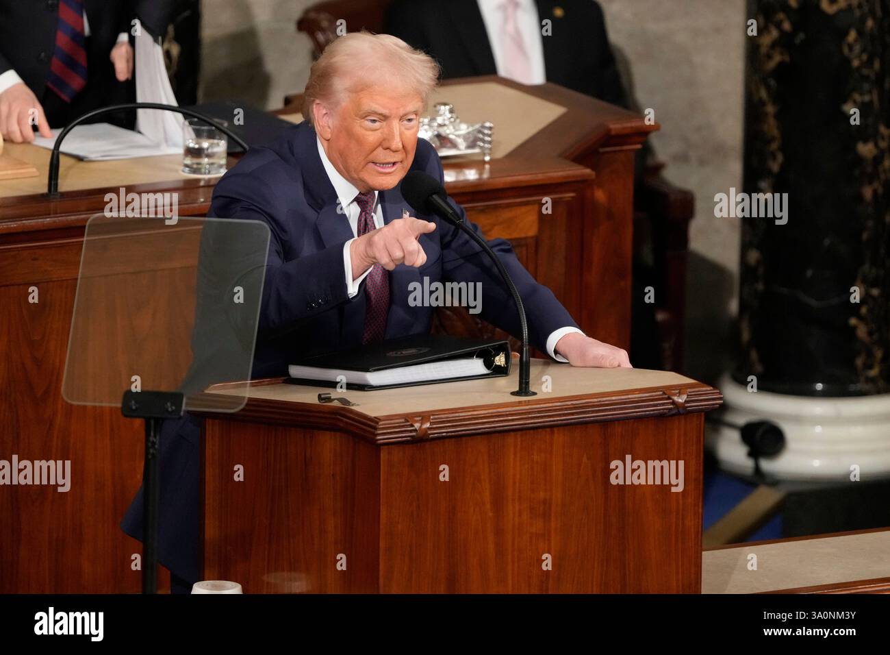 President Donald Trump gestures as he addresses a joint session of ...