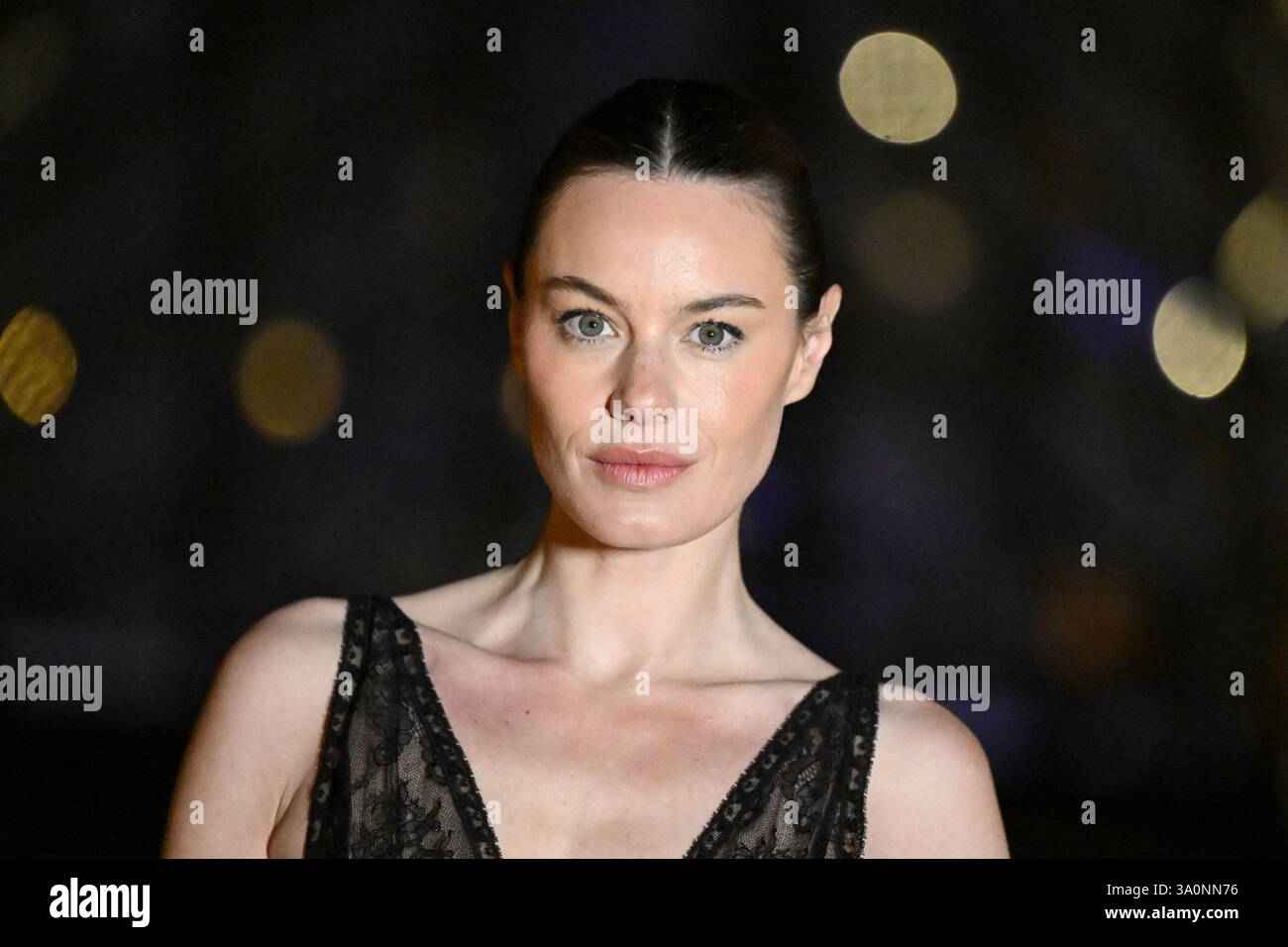 Camille Rowe attending the Le Grand Diner du Louvre Arrivals Photocall ...