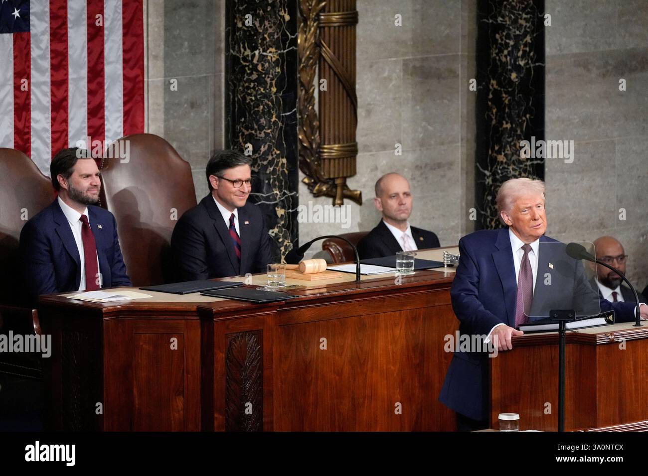 President Donald Trump speaks as Vice President JD Vance, from left ...