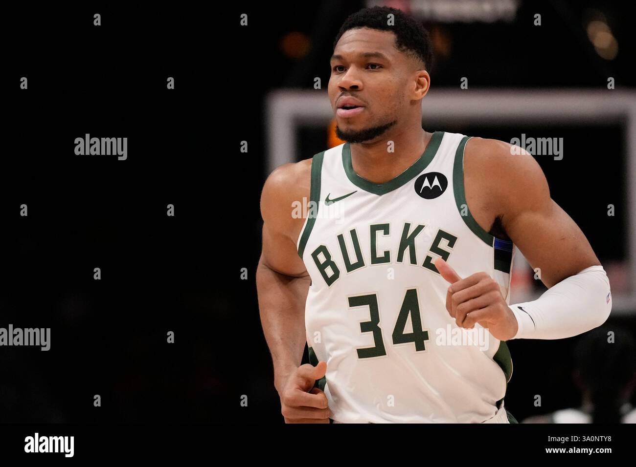 Milwaukee Bucks forward Giannis Antetokounmpo (34) runs on the court in ...