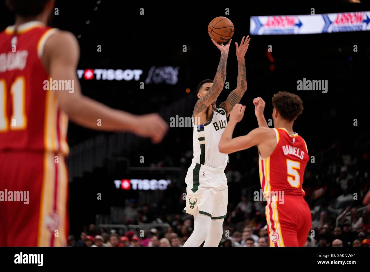 Milwaukee Bucks forward Kyle Kuzma (18) shoots the ball against Atlanta ...
