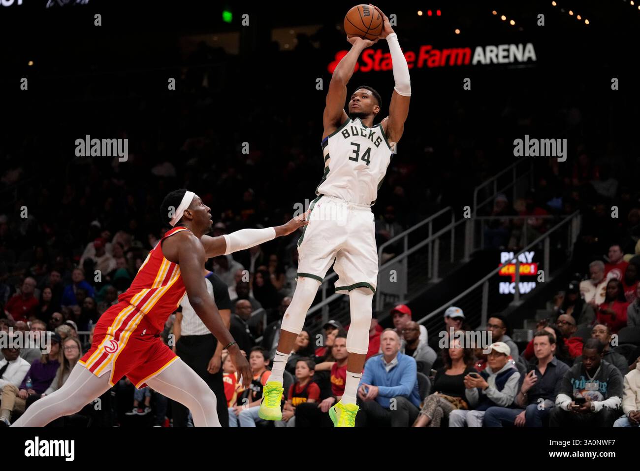 Milwaukee Bucks forward Giannis Antetokounmpo (34) shoots and scores in ...