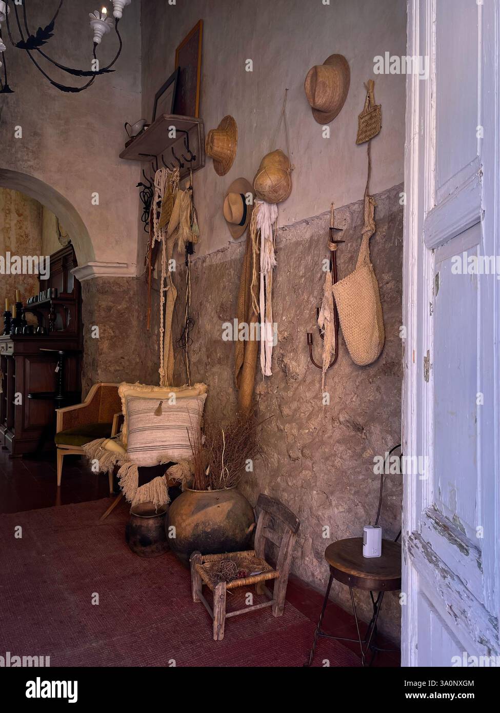 Old mexican style house entrance with antique furniture and artisanal ...
