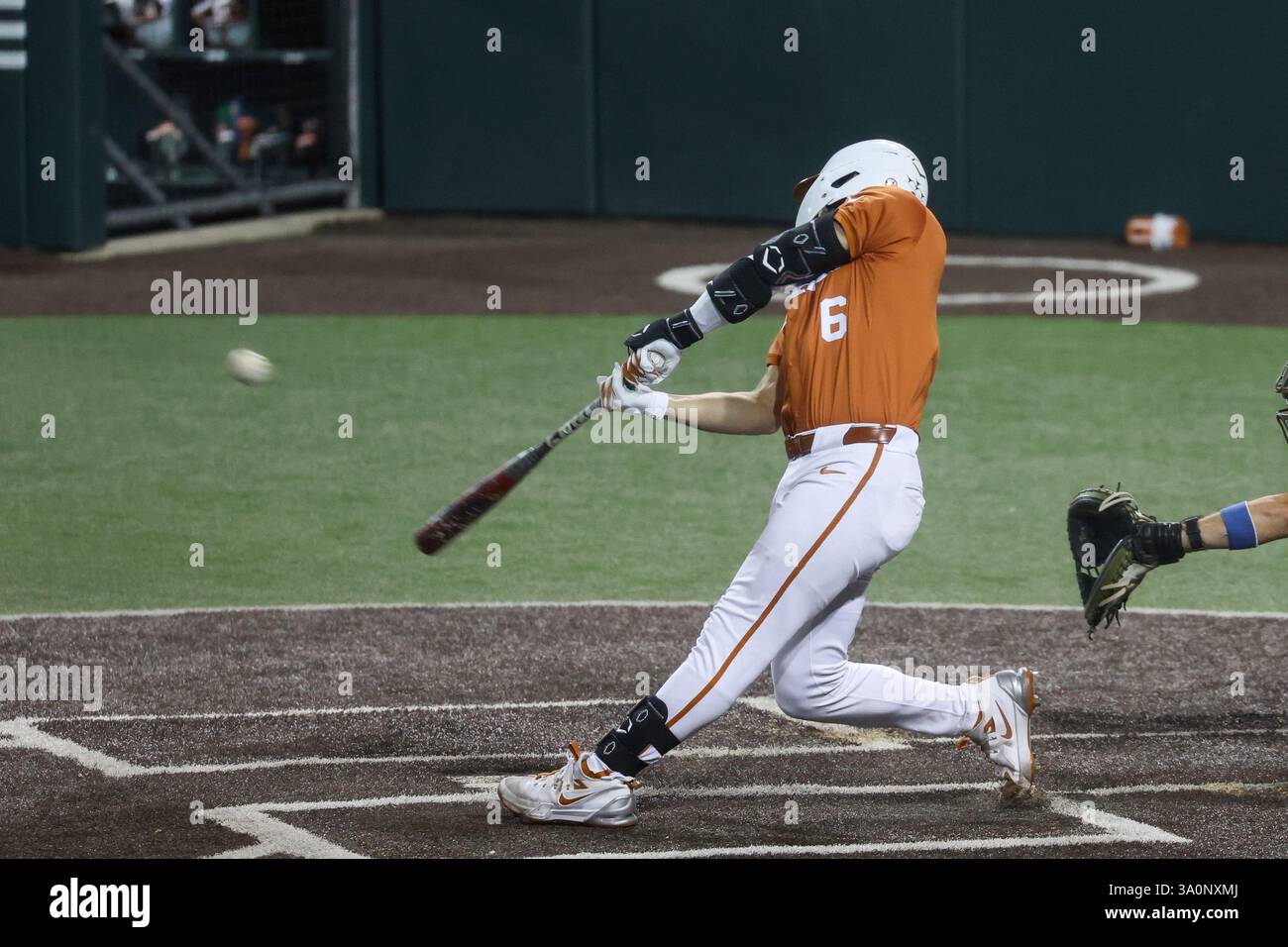 AUSTIN, TX - MARCH 04: Texas catcher Rylan Galvan (6) hits a home run ...