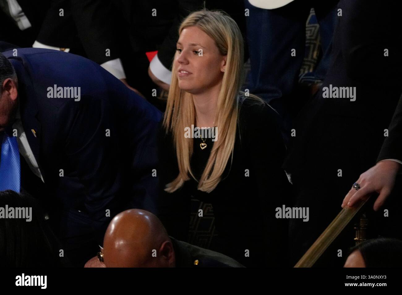 January Littlejohn of Tallahassee, Fla., listens as President Donald ...