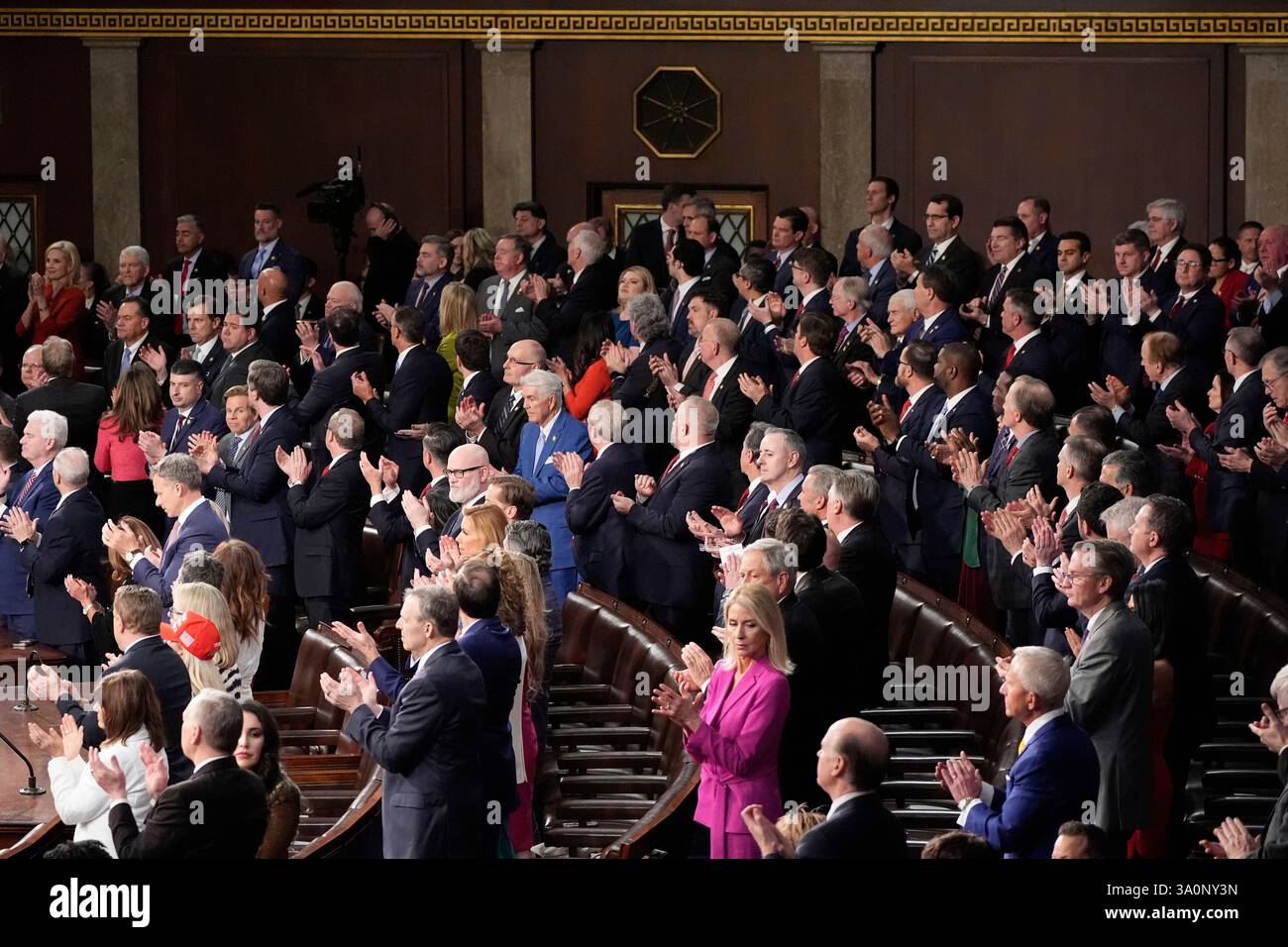 Republican members of Congress applaud as President Donald Trump ...
