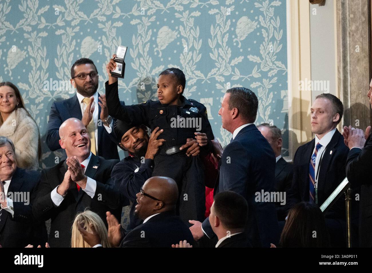 Washington, United States. 04th Mar, 2025. Devarjay "DJ" Daniel waves ...