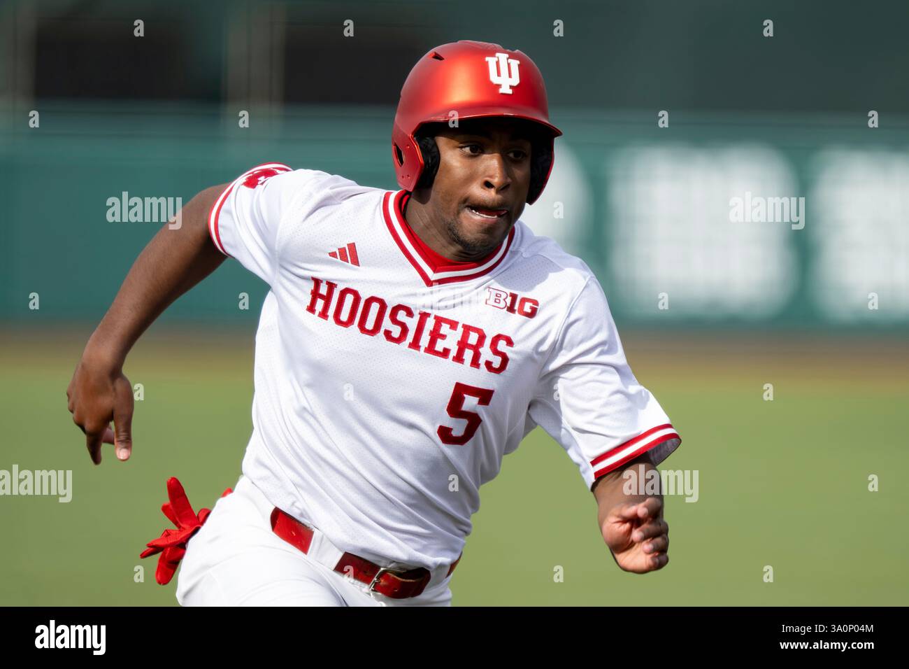 Indiana outfielder Devin Taylor (5) rounds third base en route to home ...