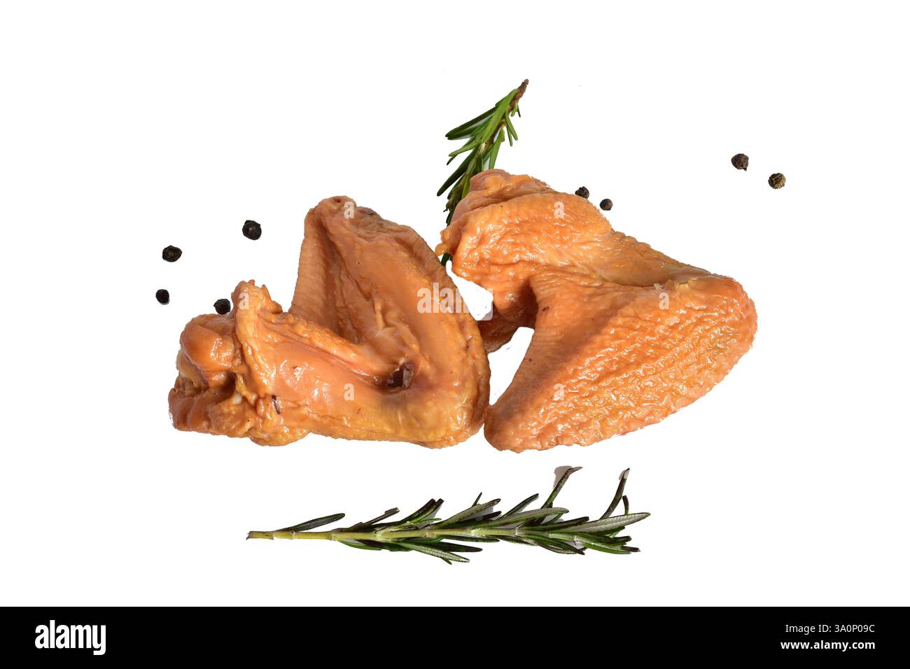 Smoked chicken wings with green cumin branch isolated on white ...