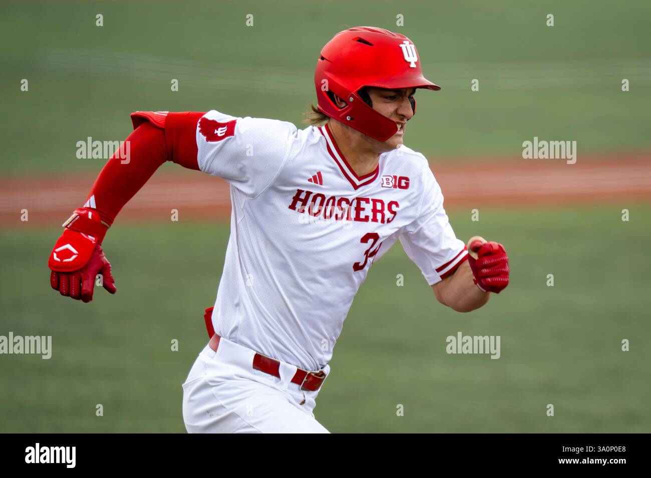 Indiana utility Jake Hanley (34) runs toward home plate during an NCAA ...