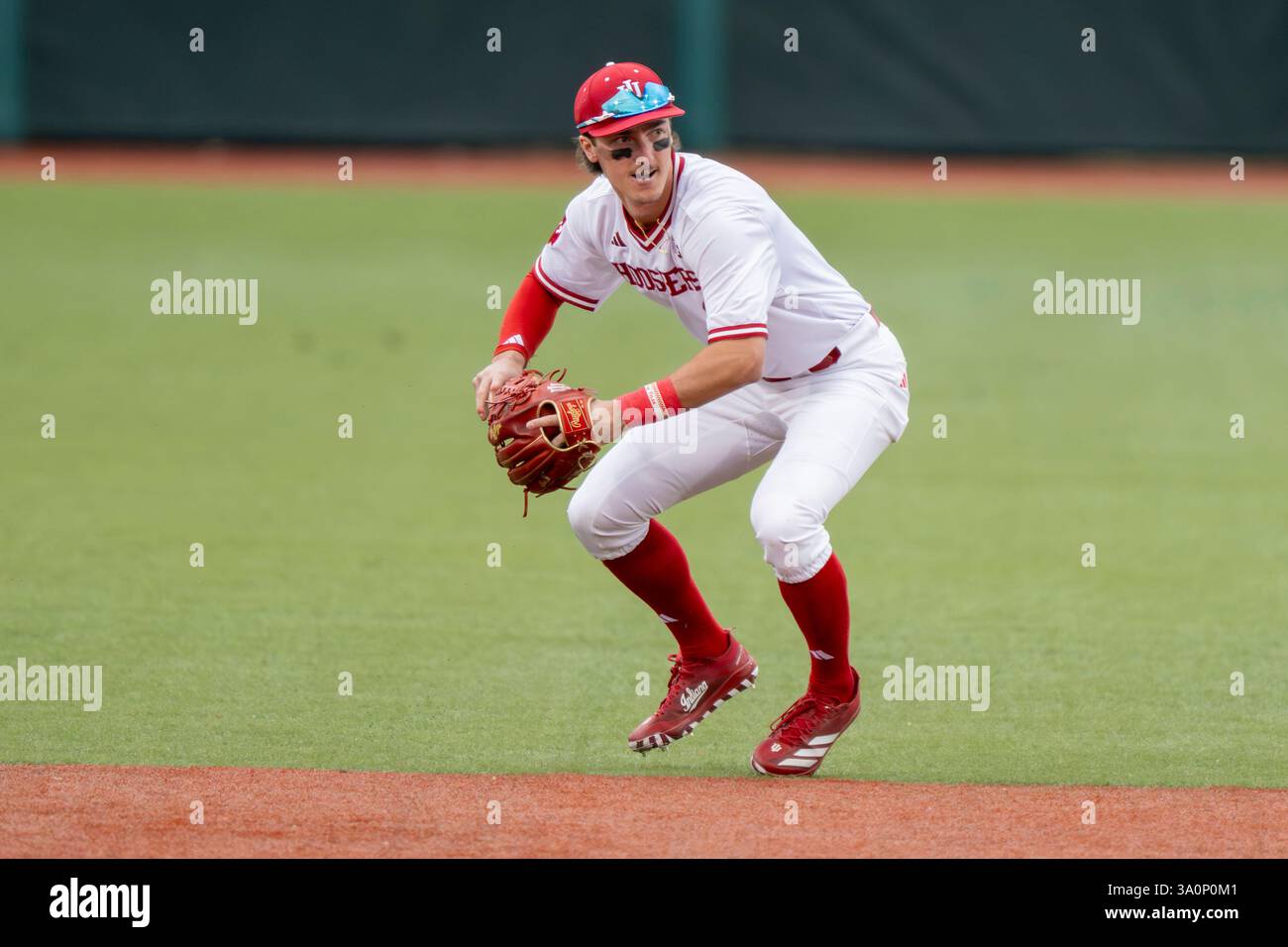 Indiana infielder Tyler Cerny (8) prepares to make a throw to first ...