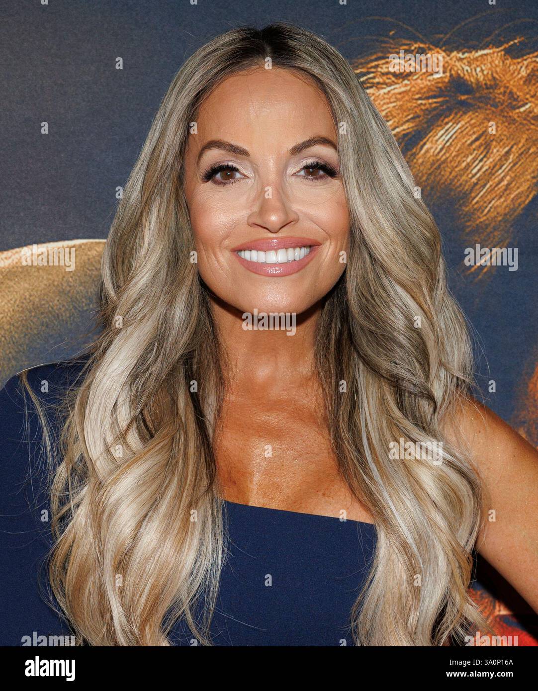 Trish Stratus attends the premiere of "Queen of the Ring" at AMC ...