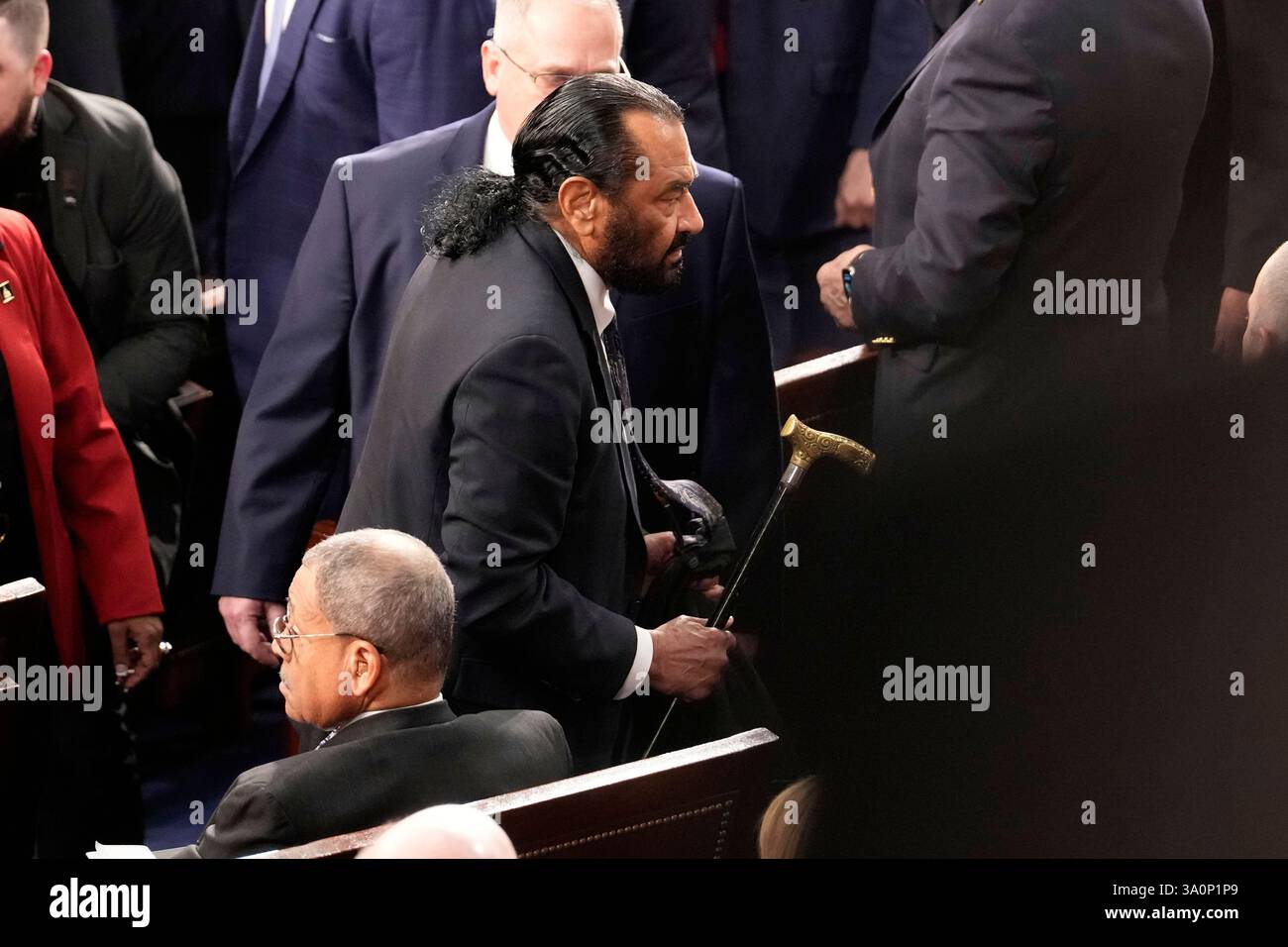 Rep. Al Green, D-Texas, is escorted out as President Donald Trump ...