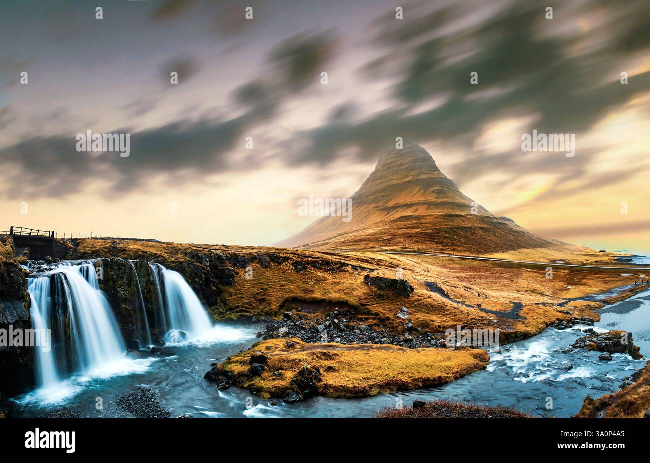 The iconic Kirkjufellsfoss waterfall in the Snaefellsnes Peninsula ...