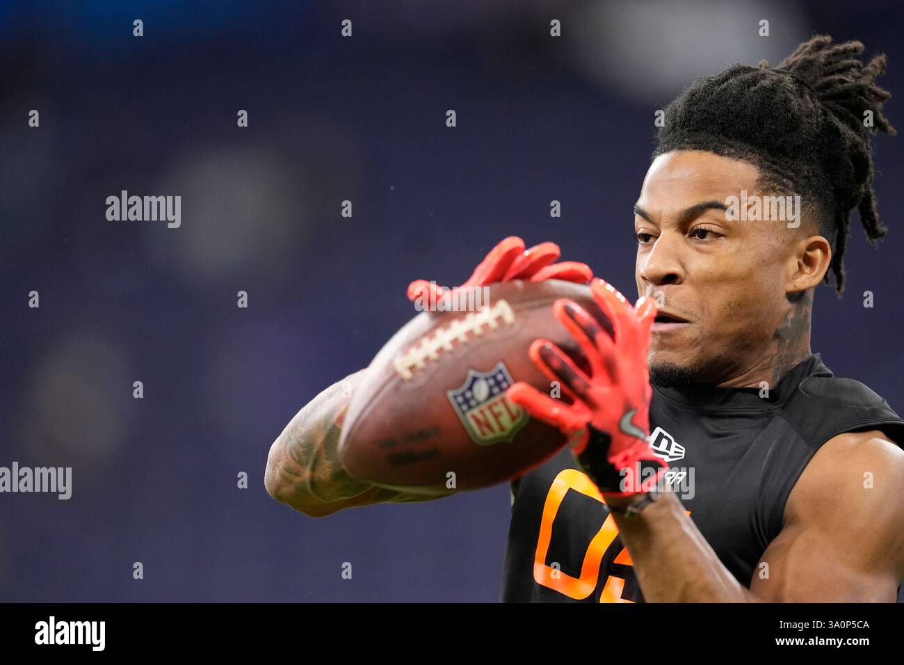 Texas wide receiver Isaiah Bond runs a drill at the NFL football ...