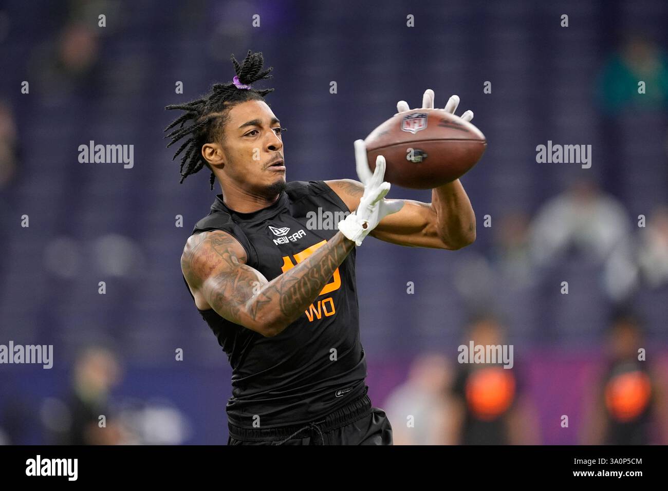 Miami wide receiver Jacolby George runs a drill at the NFL football ...