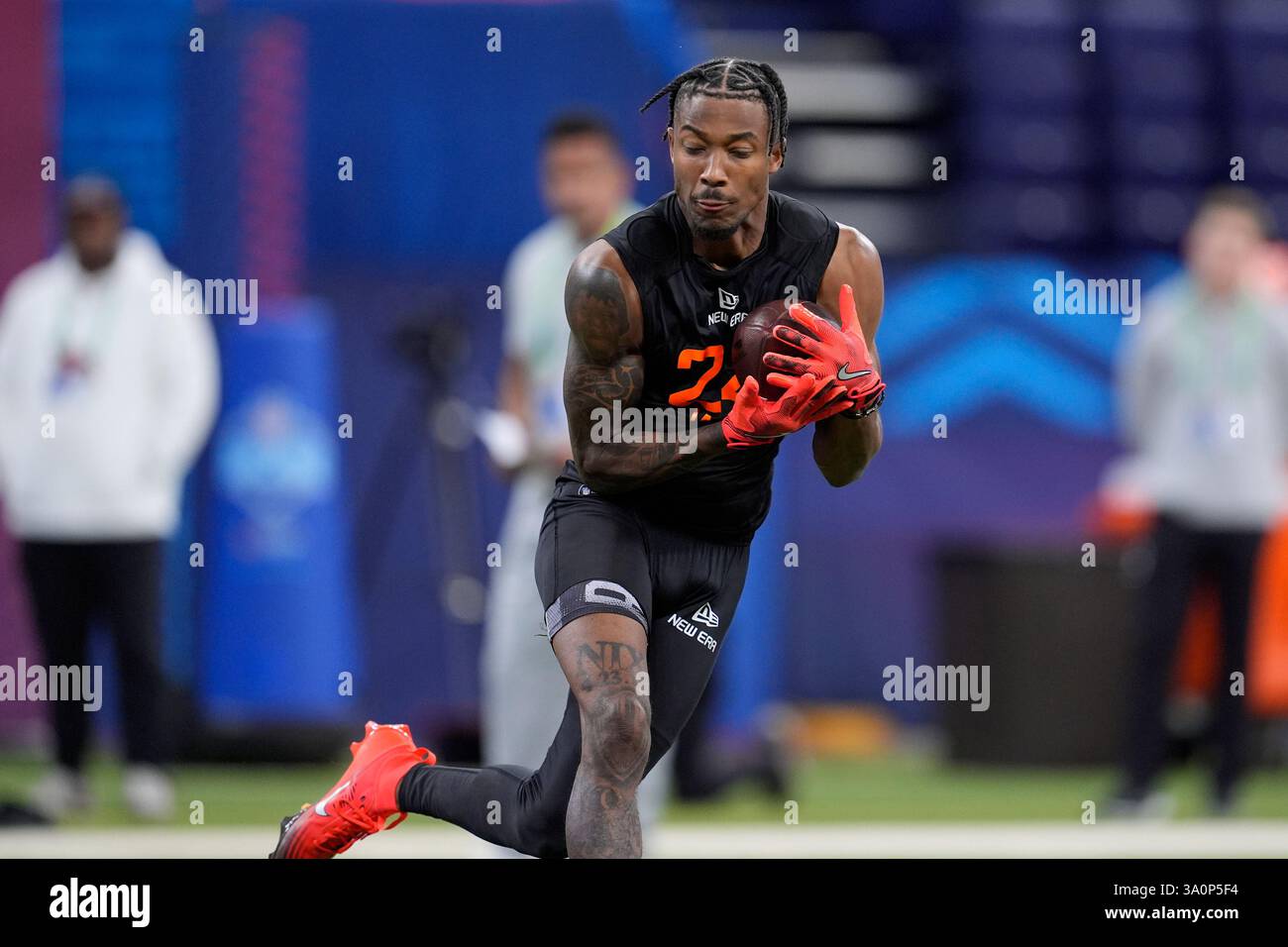 Oregon wide receiver Tez Johnson runs a drill at the NFL football ...