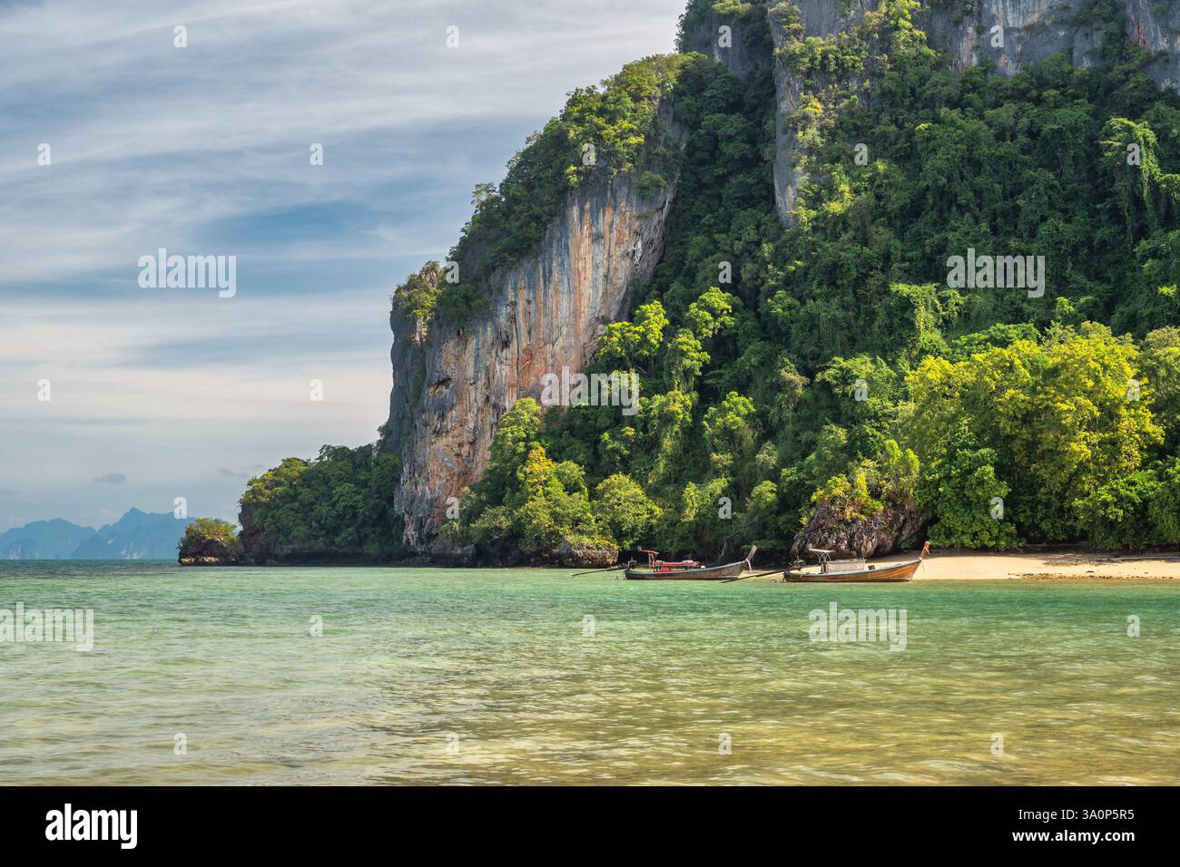 Tropical islands view with long tail boat ocean blue sea water and ...