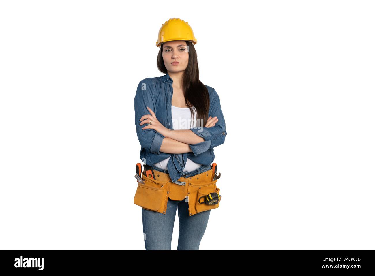 A strong and confident female construction worker wearing a yellow hard ...