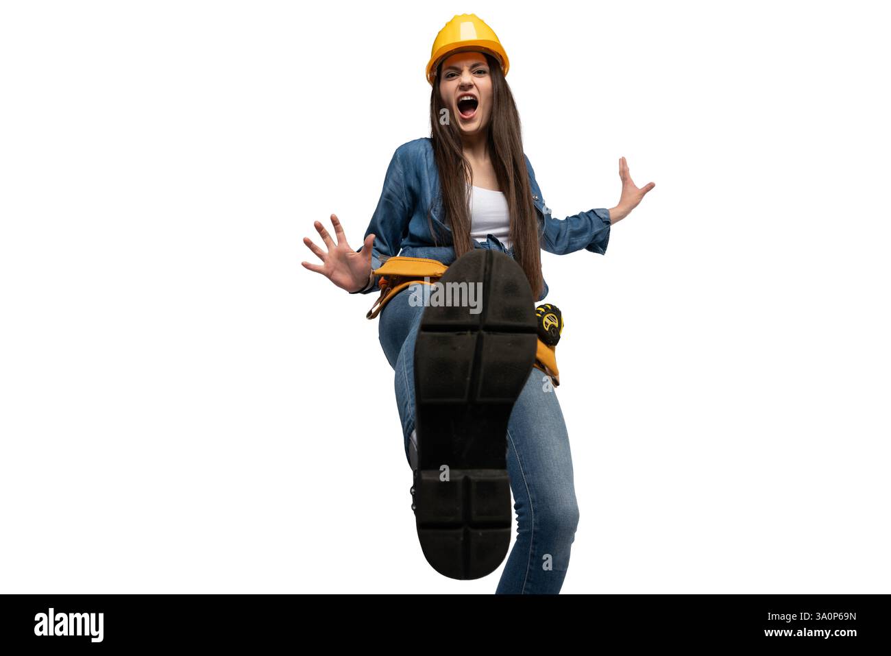 A fierce and energetic female construction worker wearing a yellow hard ...