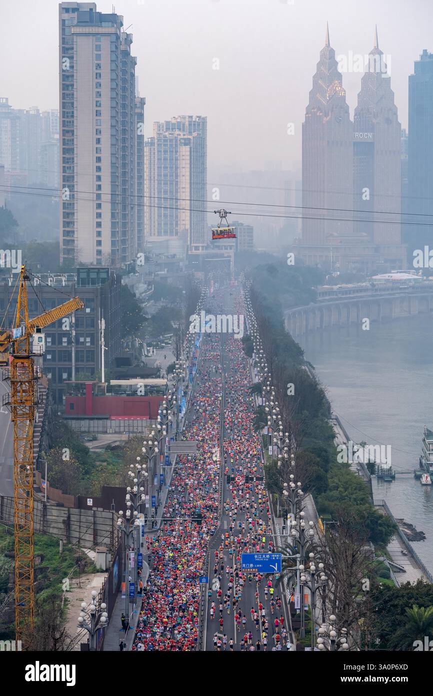 Aerial photo shows people running at the 2025 Chongqing Marathon ...